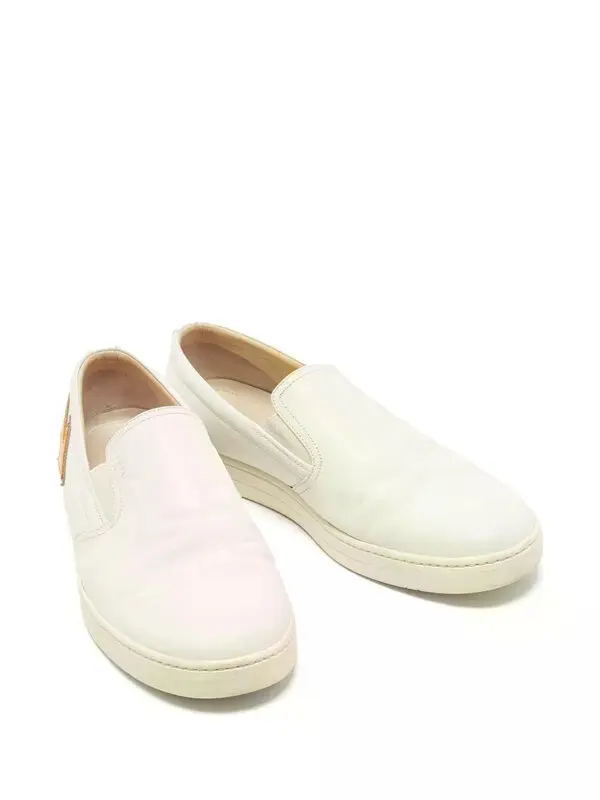 Prada Leather Slip-on Sneakers With Arrow Motif