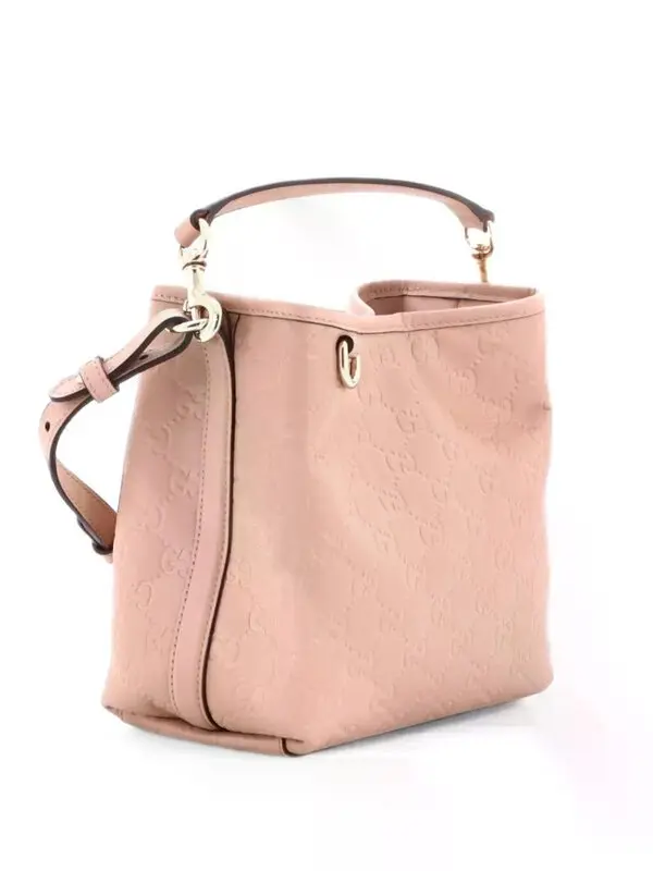 Gucci Gg Emblem Gg Embossed Leather Small Bucket Bag - Neutrals