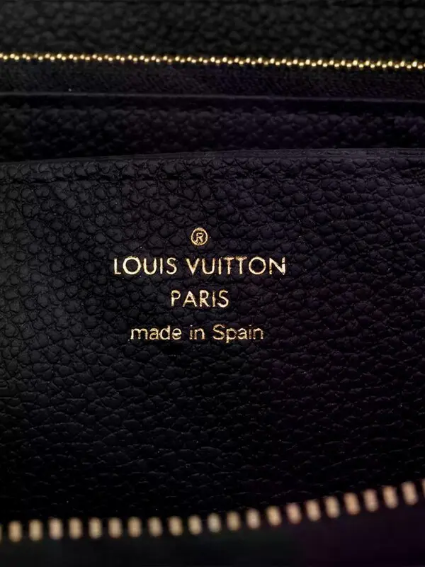 LOUIS VUITTON 2010-2026 Bicolor Monogram Empreinte Giant Zippy Wallet Long Wallets