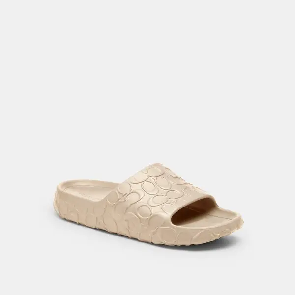 COACH OUTLET Coach Signature Embossed Slides - Ivory
