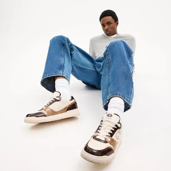 COACH OUTLET Soho Sneaker With Patent Signature - Brown/maple