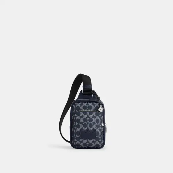 COACH OUTLET Racer Sling Pack In Signature Canvas With Charms