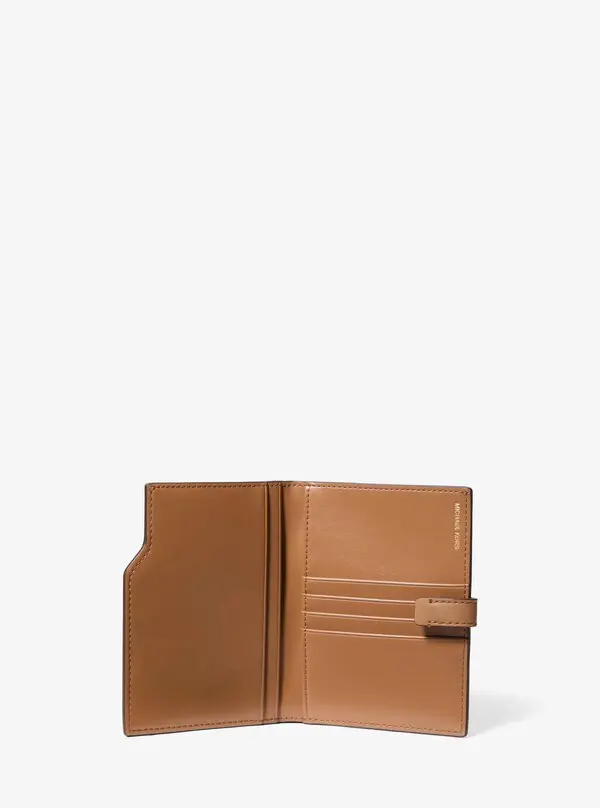 Michael Kors Jet Set Signature Logo Passport Wallet In By