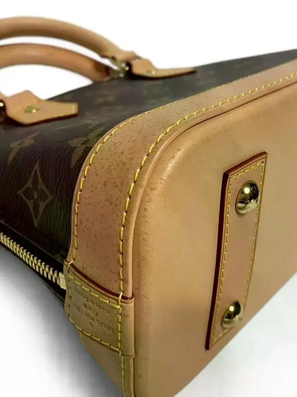 LOUIS VUITTON Monogram Alma Handbag - Brown