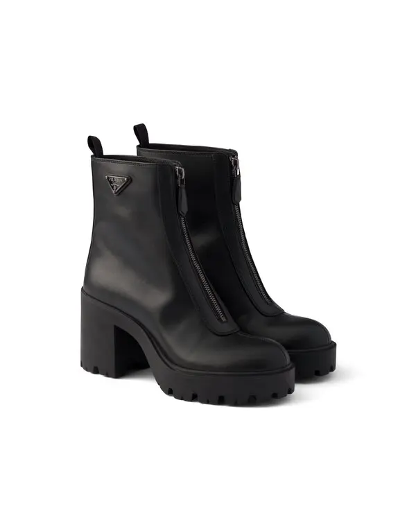 Prada Leather Ankle Boots With Zipper And Lug Sole