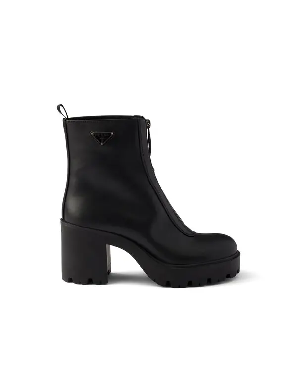 Prada Leather Ankle Boots With Zipper And Lug Sole