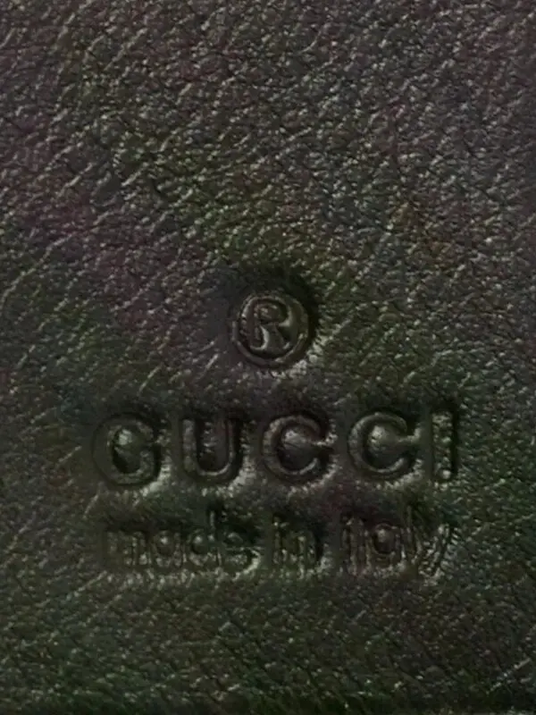 Gucci Guccissima Metal-bar Bifold Wallet