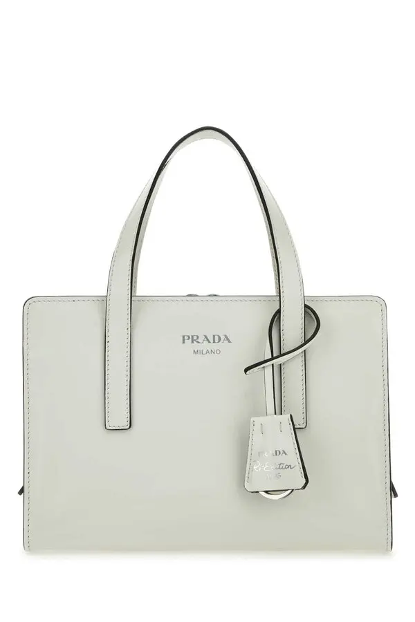 Prada Re-edition 1995 Mini Leather Handbag, 22 Cm X 15 Cm X 7.5 Cm With Adjustable Shoulder Strap