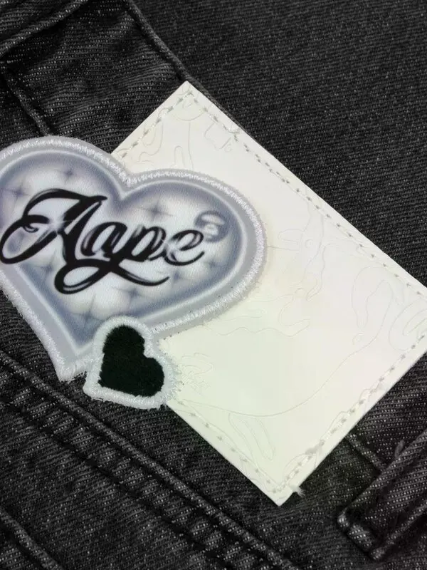 AAPE BY *A BATHING APE Moonface Patch Distressed Jeans