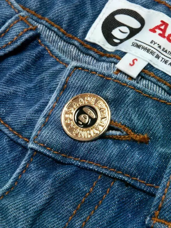 AAPE BY *A BATHING APE Moonface Plaque Raw-edge Denim Shorts