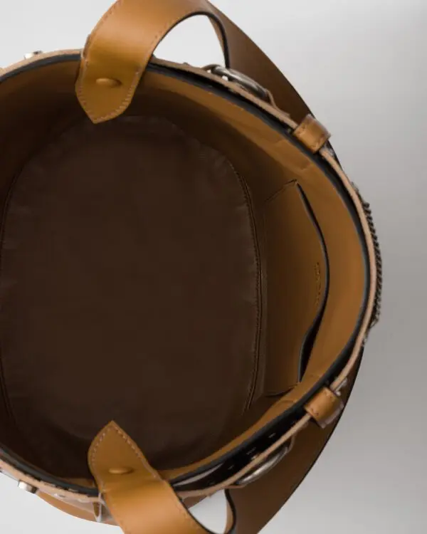 Prada Buckled Leather Bucket Bag With Studded Belt