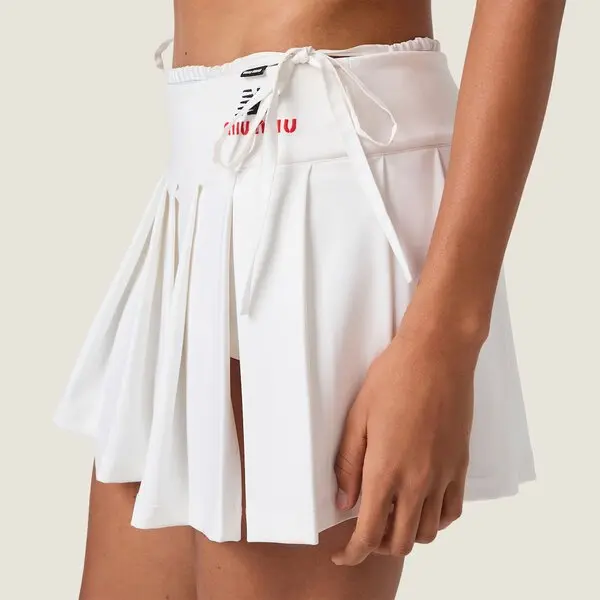 Miu Miu Pleated Stretch Jersey Skirt With Embroidered Logo