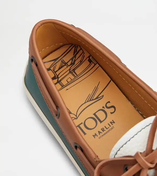 TOD'S Round-toe Loafers With Signature Embossed Pattern