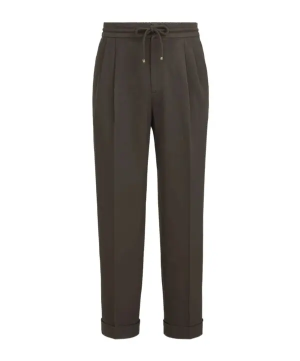 Brunello Cucinelli Garment-dyed Twisted Cotton Gabardine Trousers With Double Pleats - Brown