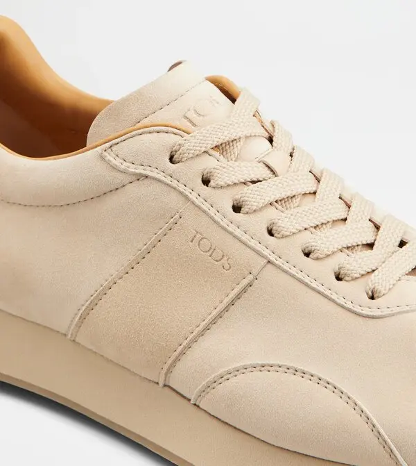 TOD'S Sneakers With Embossed Logo Detail