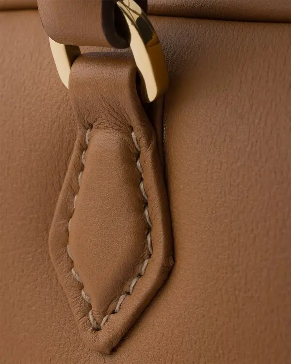 Prada Medium Leather Top-handle Bag With Monogram Detail - Caramel