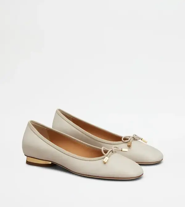 TOD'S Ballerina Flats With Bow Detail And Metal Logo Accent