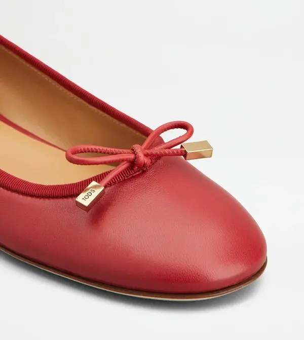 TOD'S Round Toe Ballet Flats With Bow Detailing