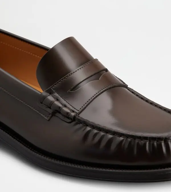 TOD'S Round Toe Loafers With Logo Detail