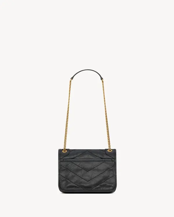 Saint Laurent Niki Baby In Vintage Leather With Chain Strap - Black