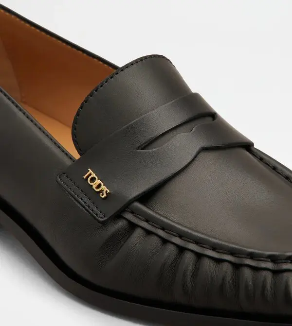 TOD'S Round Toe Loafers With Penny Strap Detail