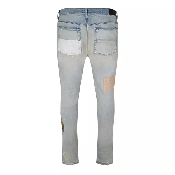 Amiri Distressed Skinny Jeans