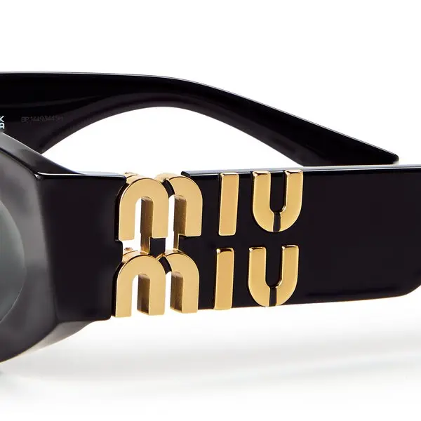 Miu Miu Oval Sunglasses