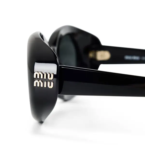 Miu Miu Oval Sunglasses