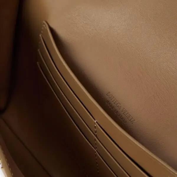 Bottega Veneta Woven Sheepskin Clutch With Top Handle - Brown