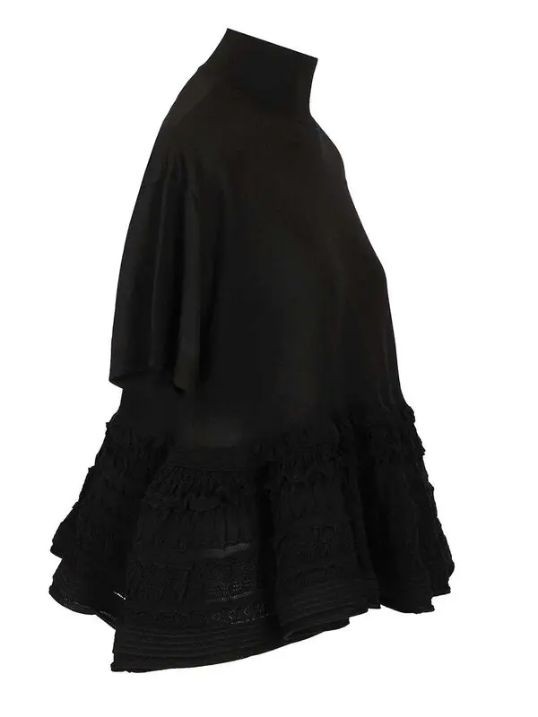 Alaïa Cryoline Wool Peplum Top With High Neck And Ruffled Hem - Black
