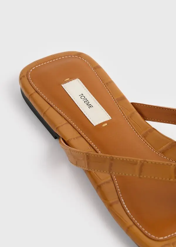 TOTEME Croc-embossed Flip Flops