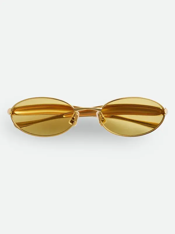 Bottega Veneta Oval Sunglasses With Sculptural Sardine-shape Metal Temples - Oro
