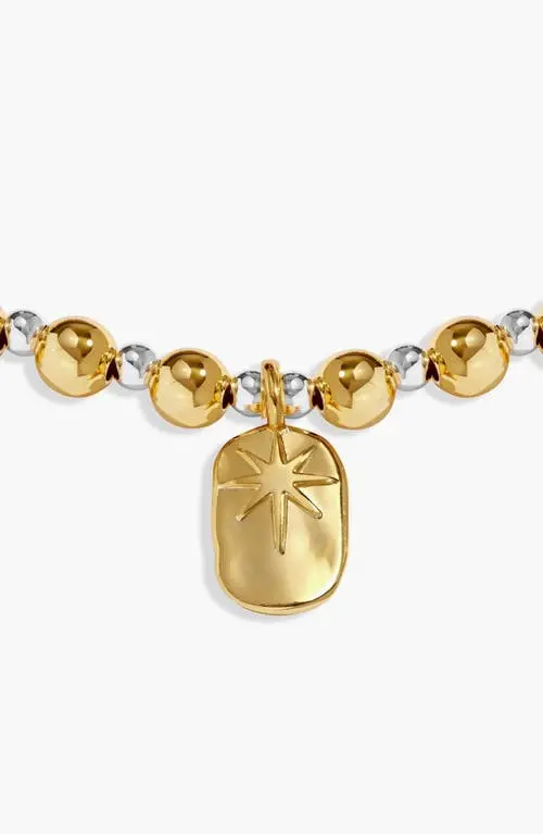 A LITTLES & CO Be Happy' Beaded Bracelet With Charm And Embroidered Pouch