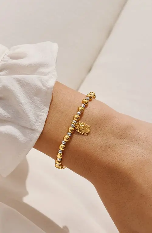A LITTLES & CO Be Happy' Beaded Bracelet With Charm And Embroidered Pouch