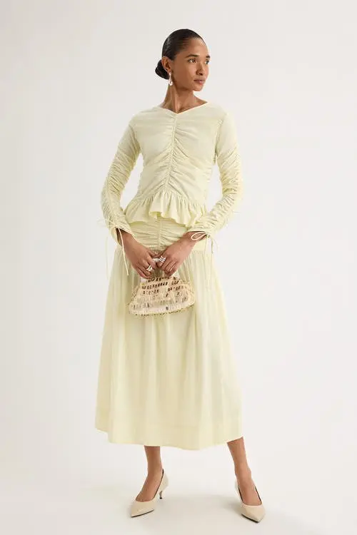 Merlette Arena Ruched Peplum Top With Drawcord Sleeves
