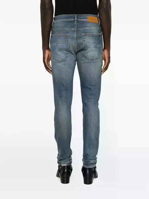 Amiri Distressed Patchwork Jeans