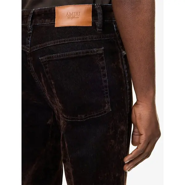 Amiri Flared-leg 5-pocket Flocked Denim Jeans