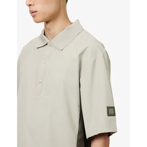 MANORS Shooter Branded Stretch-woven Polo Shirt - Dune