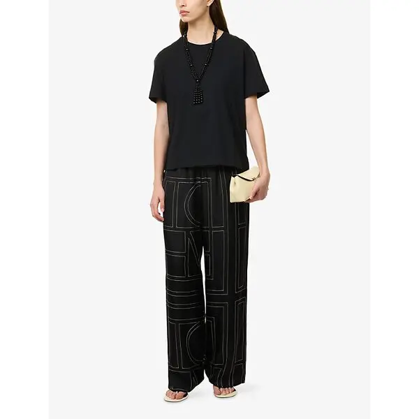 TOTEME Monogram-print Silk-twill Pyjama Bottoms - Black