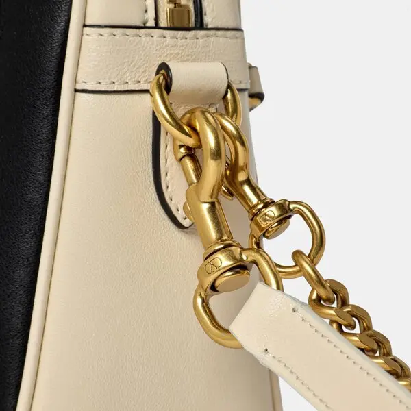 Valentino Garavani Two-tone Duffle Handbag With Gold Tone Chain Strap