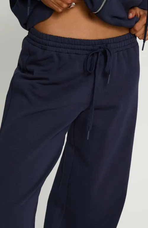 Princess Polly Summits Mid Rise Flare Track Pants