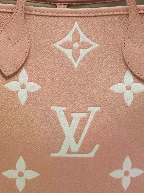 LOUIS VUITTON Neverfull Mm Monogram Empreinte Tote Bag - Pink