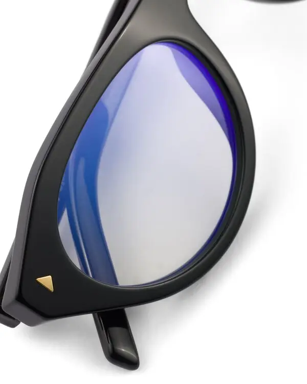 Prada Sunglasses With The Iconic Metal Plaque