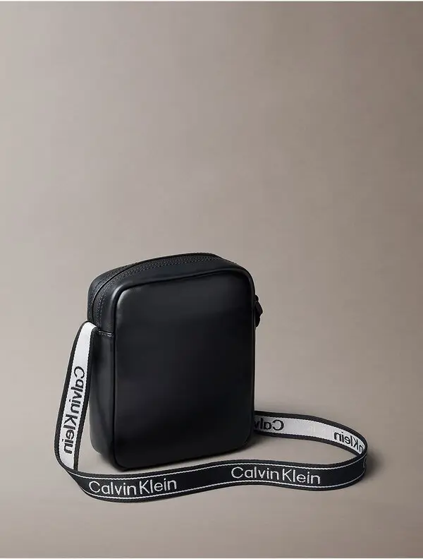Calvin Klein Bold Monologo Webbing Strap Reporter Bag
