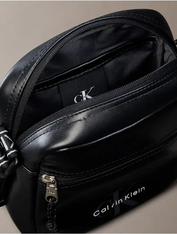 Calvin Klein Bold Monologo Webbing Strap Reporter Bag