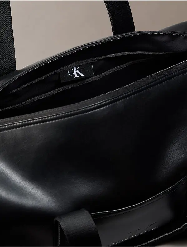 Calvin Klein Bold Monologo Webbing Strap Weekender Bag