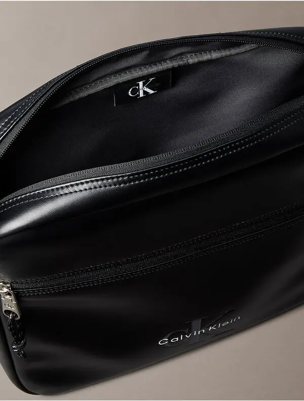 Calvin Klein Bold Monologo Webbing Strap Flight Bag