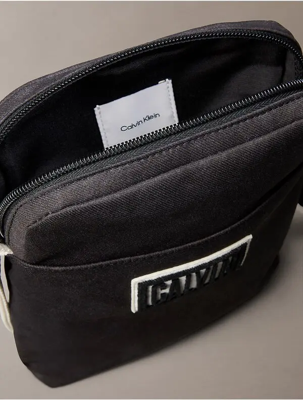 Calvin Klein Bold Logo Graphic Reporter Bag
