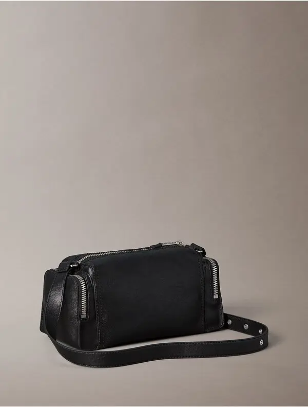 Calvin Klein Embossed Monologo Zip Flight Bag