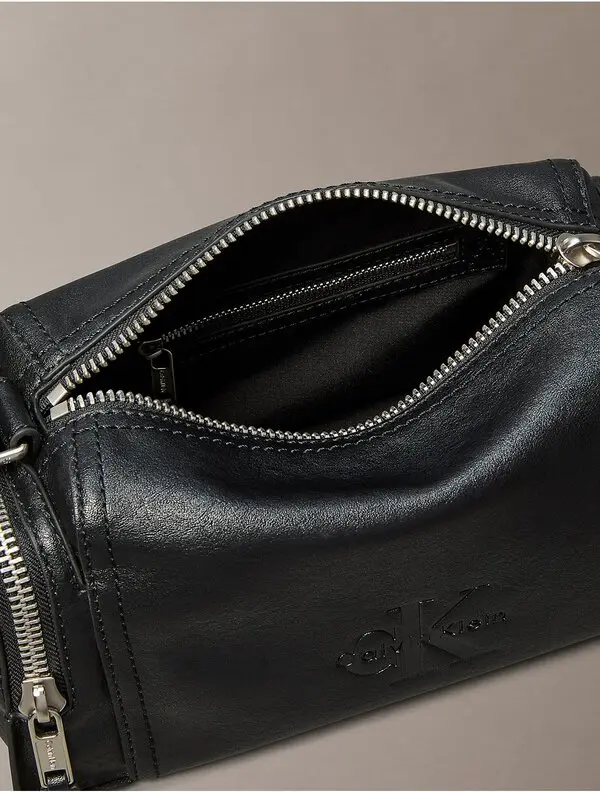 Calvin Klein Embossed Monologo Zip Flight Bag